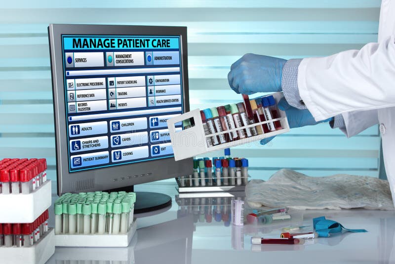 Doctor with Tray Blood Samples in Hands in Front of Computer of Stock ...