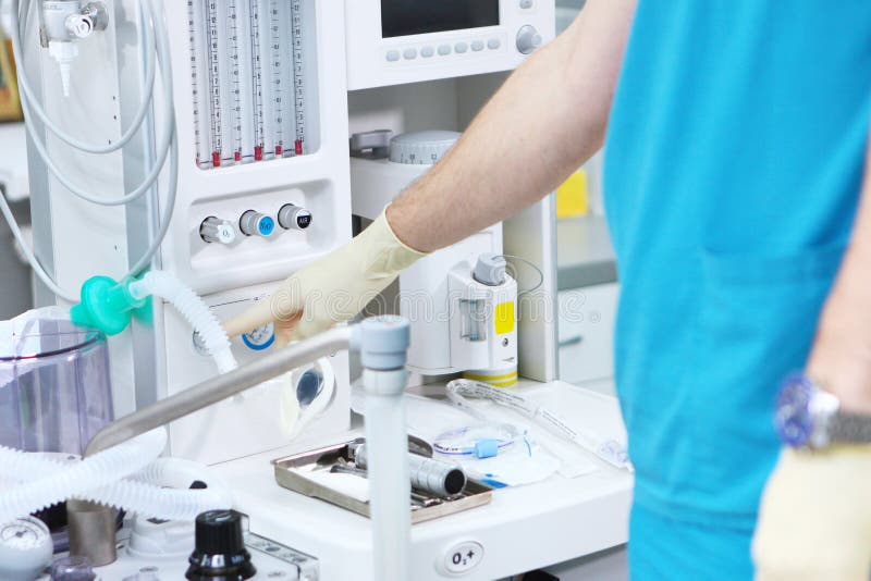 The Anesthesiologist Turns on the Machine for Artificial Ventilation of ...