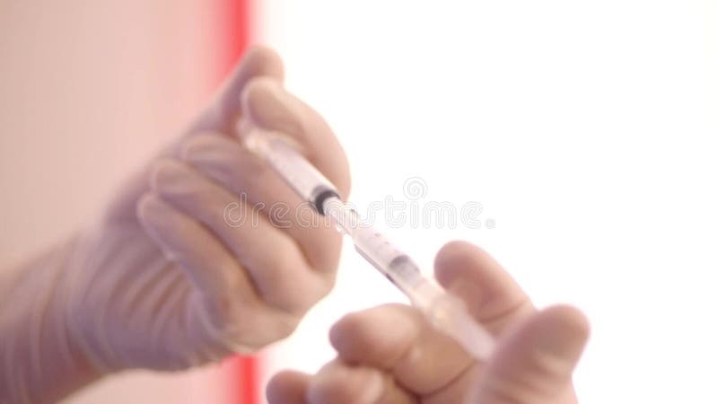 The Doctor with Two Syringe Mix Different Types of Medication Stock ...