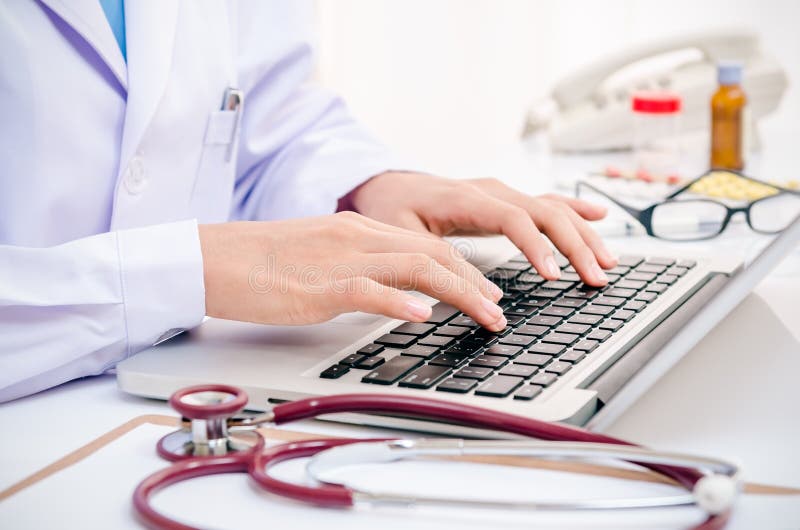 Doctor typing on computer stock image. Image of discovery - 55462413