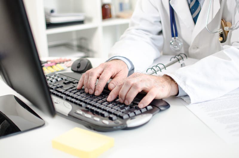 Doctor Typing on a Computer Keyboard Stock Image - Image of modern ...