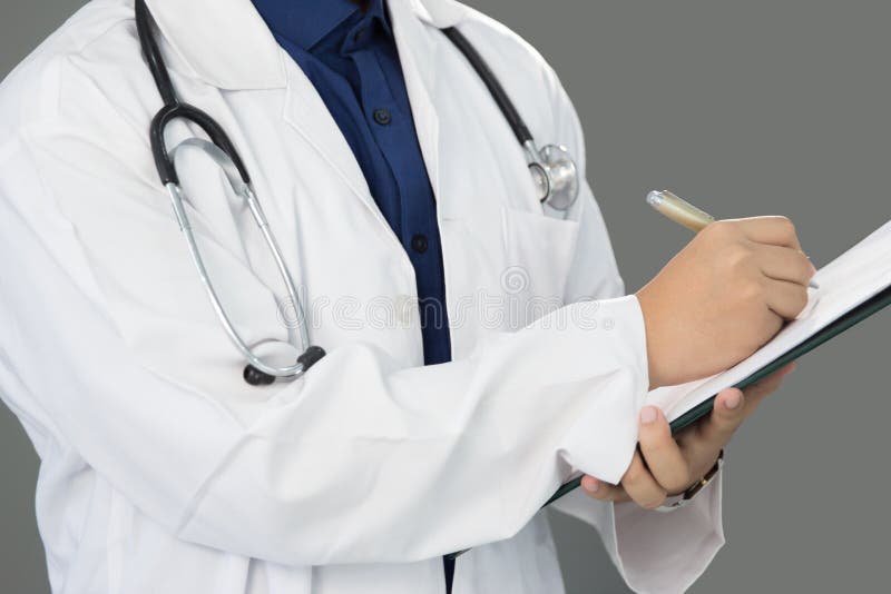 Doctor and the uniform stock photo. Image of happy, friendly - 112759200