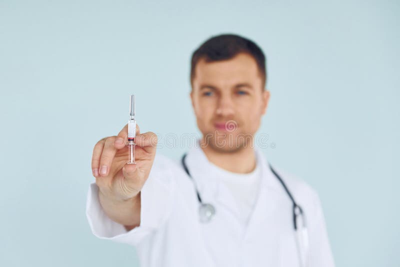 Doctor in Uniform Standing in the Studio Stock Photo - Image of ...