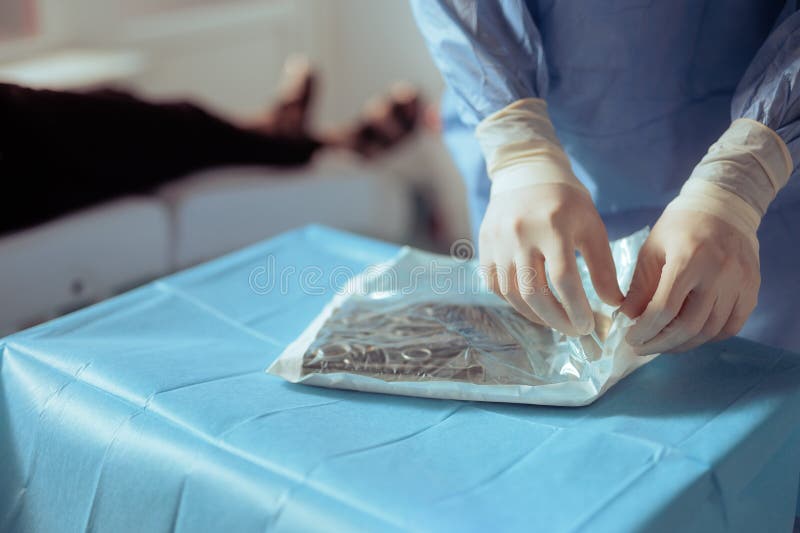 Doctor Unpacking Sterile Surgery Instruments at Work Stock Photo ...