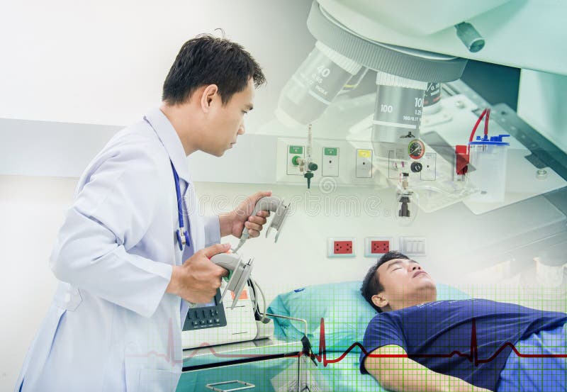 Doctor Use EKG or ECG Prepare Use Defibrillator System Stock Photo ...