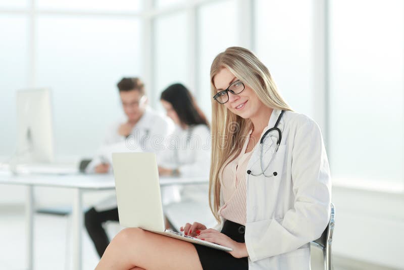 Doctor Uses a Laptop To Work with Documents Stock Image - Image of ...