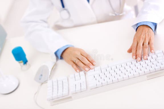 Doctor using computer stock photo. Image of horizontal - 7674694