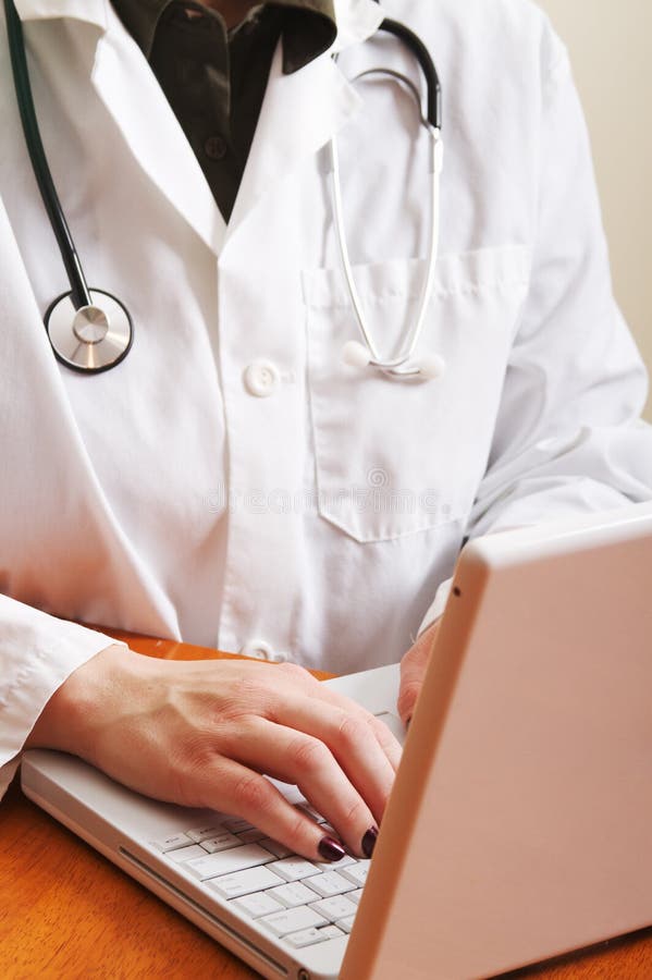 A Doctor Using a Computer Laptop Stock Image - Image of hospital ...