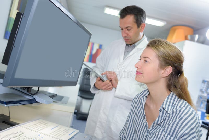 Doctor Using Computer To Inform Patient Stock Photo - Image of explain ...