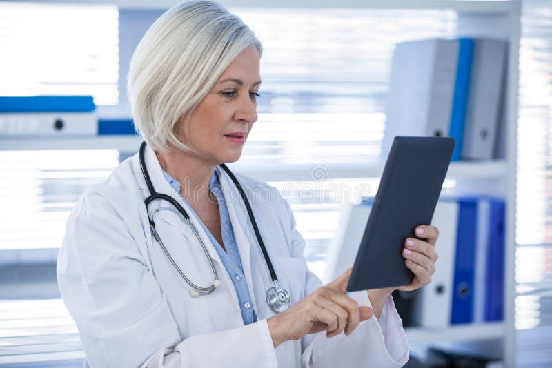 Doctor Using Digital Tablet Stock Image - Image of expertise ...