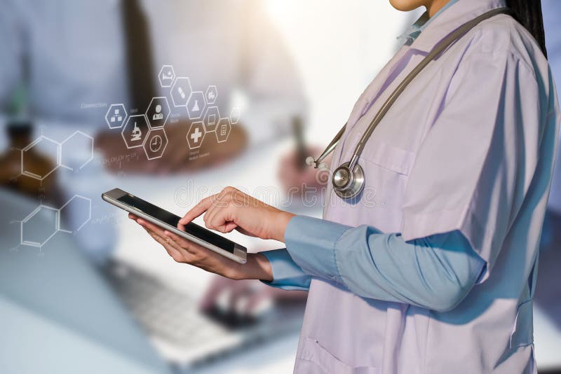 Doctor Using Digital Technology Tablet in the Office. Stock Image ...