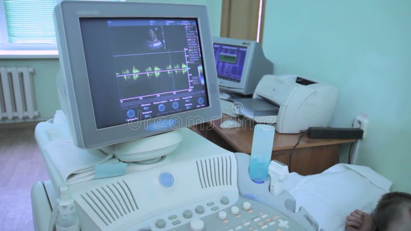 Doctor Using the ECHO Echocardiography Diagram on the Screen Stock ...