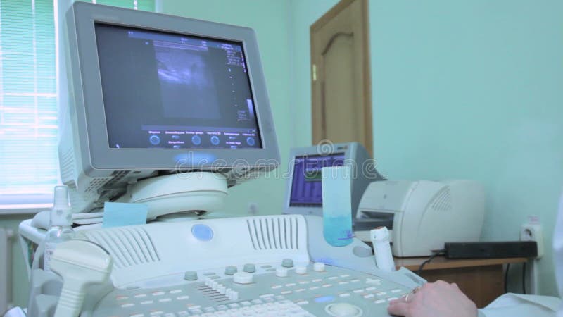 Doctor Using the ECHO Ultrasonography Explores Vessels in Humans Stock ...