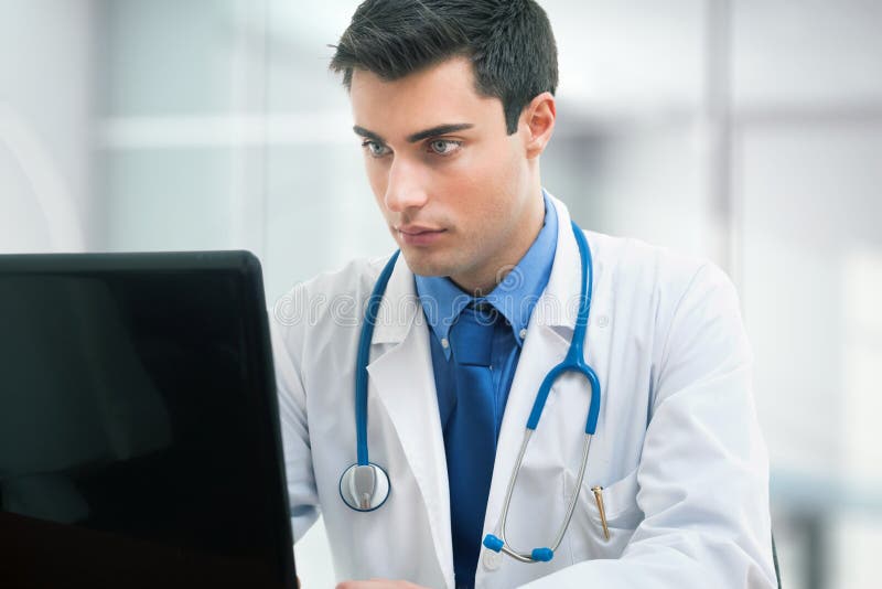 Doctor using a laptop stock photo. Image of medicine - 30287346