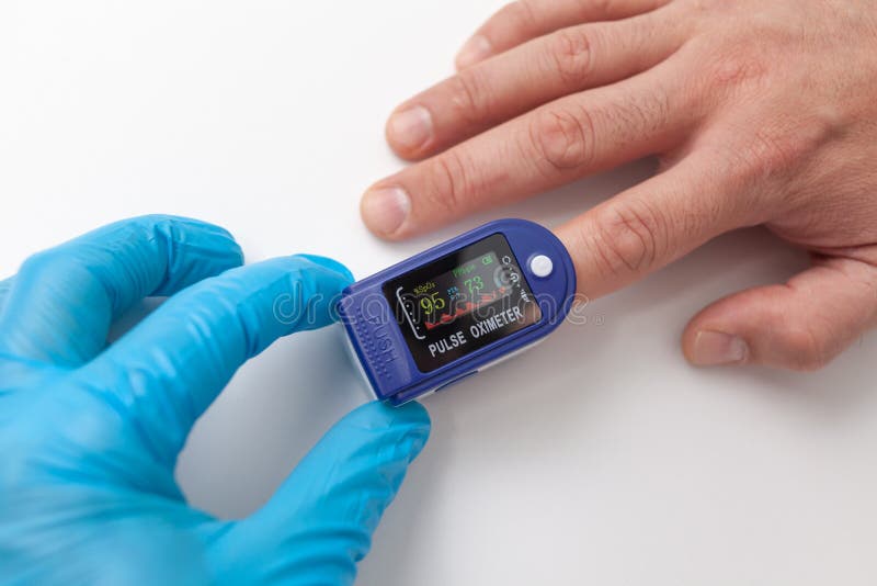 Doctor Using Pulse Oximeter To Check Patient Oxygen Saturation Stock ...