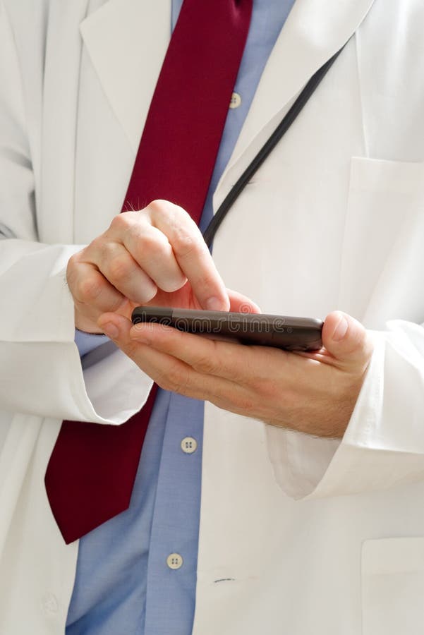 Doctor Using Smartphone Device Stock Photo - Image of uniform, internet ...