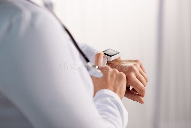 Doctor using smartwatch stock photo. Image of people - 90496020