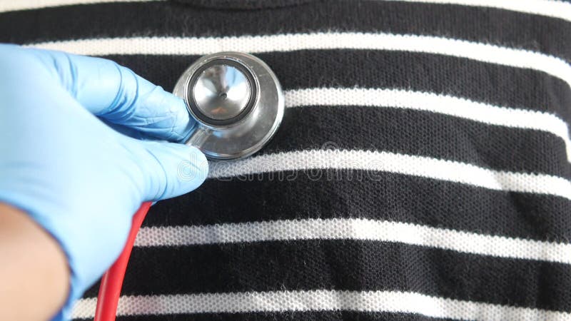 Doctor Using a Stethoscope Checking Body, Close Up Stock Video - Video ...
