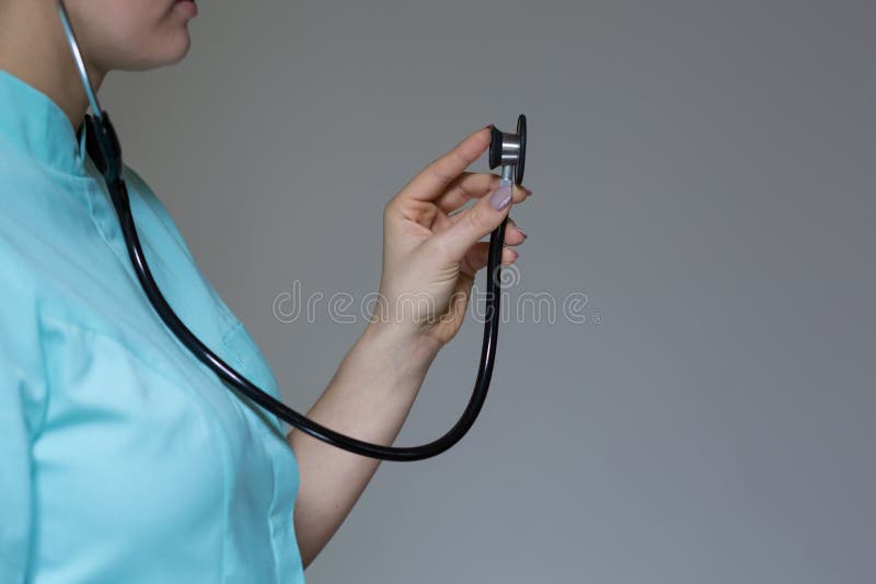 Doctor using a stethoscope stock image. Image of doctor - 48723439