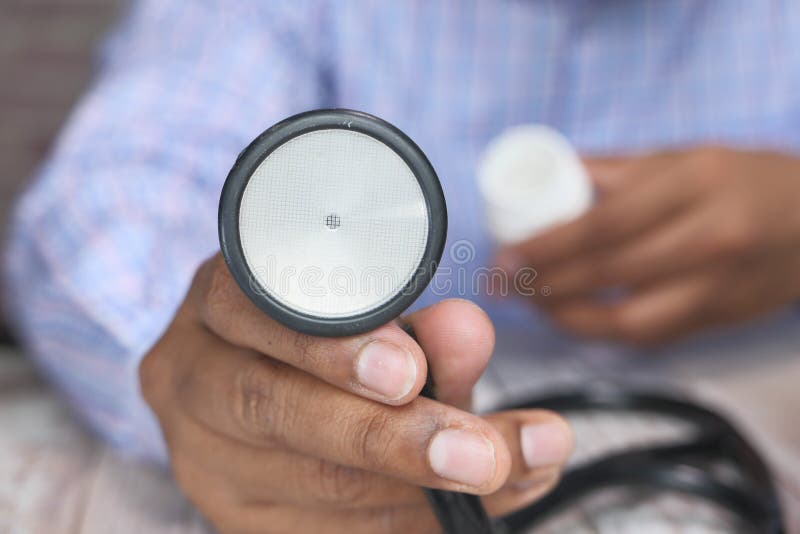 Doctor Using Stethoscope in Hospital, Close Up Stock Image - Image of ...