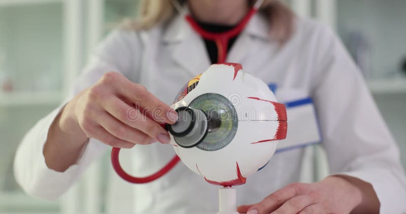 Doctor Using a Stethoscope on a Model Eye Stock Video - Video of ...