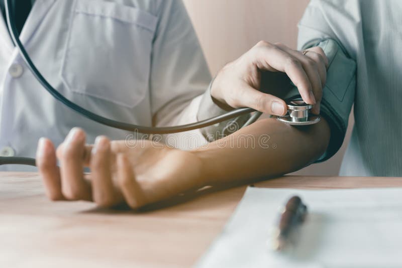 Doctor Using Stethoscope Take a Tap on the Patient`s Arm. Stock Photo ...