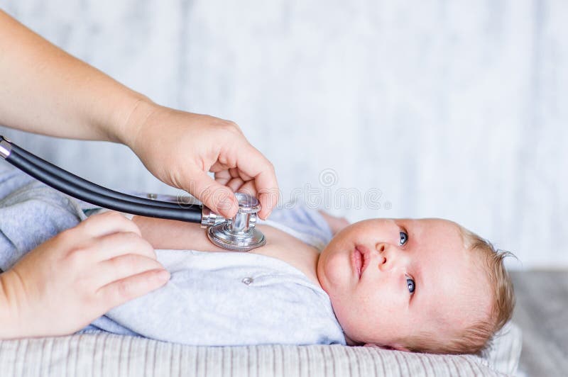 Doctor Using a Stethoscope To Listen To Kid& X27;s Chest Checking ...