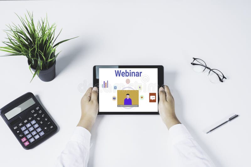Doctor Using a Tablet Computer for Online Training Webinars Stock Photo ...