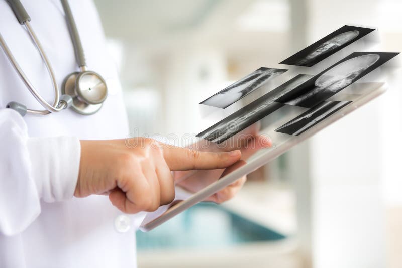 Female Doctor Using Ipad at Work in Hospital Stock Image - Image of ...