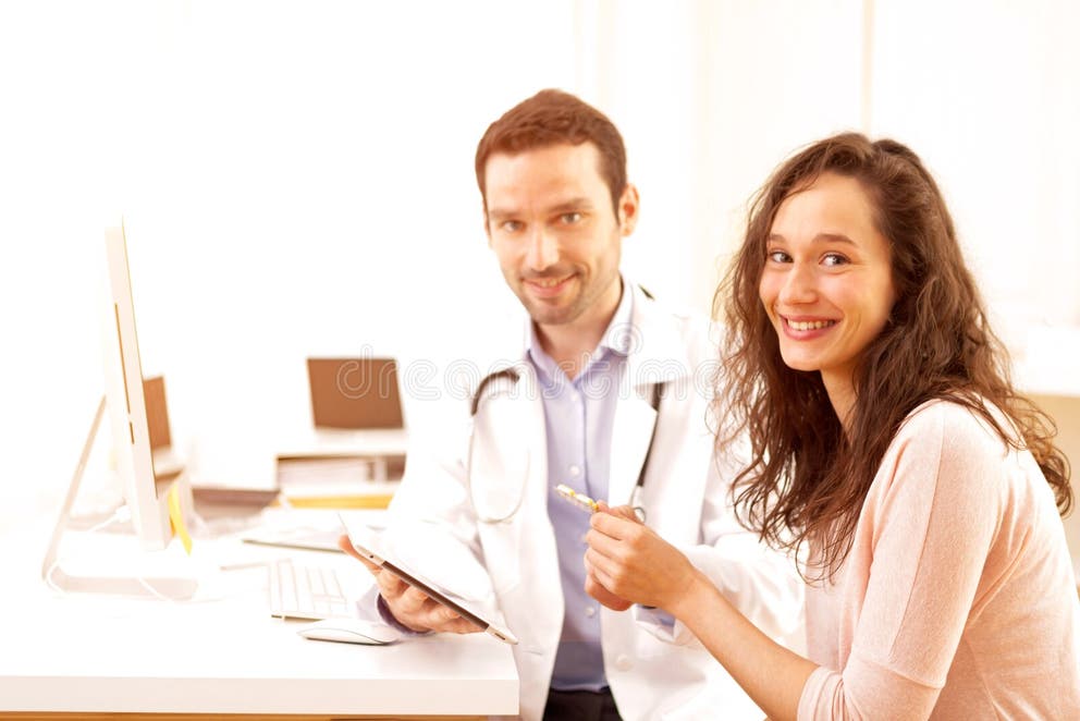 Doctor Using Tablet To Inform Patient Stock Photo - Image of office ...