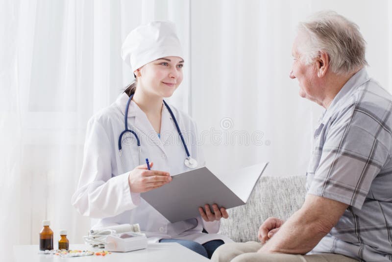 Doctor Visit To Elderly Patient Stock Photo - Image of hospital, people ...