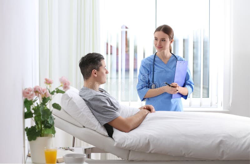 Doctor Visiting Her Patient in Hospital Stock Image - Image of ...