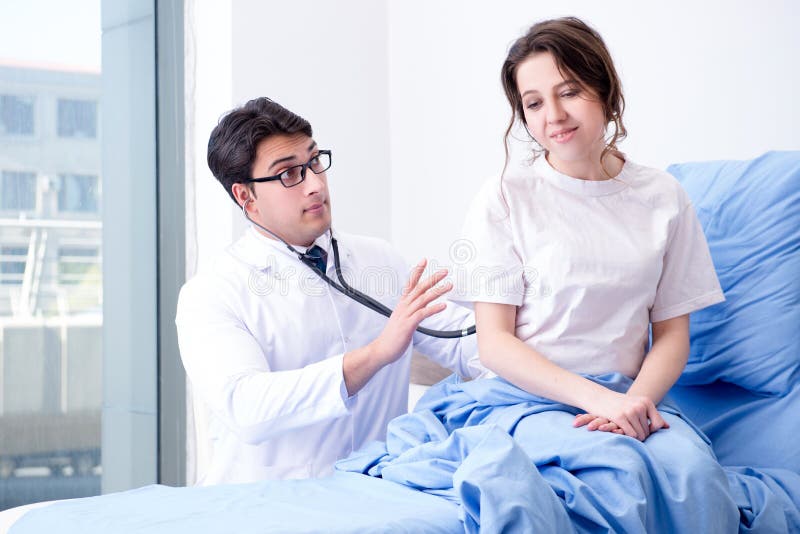 The Doctor Visiting Patient in Hospital Room Stock Image - Image of ...