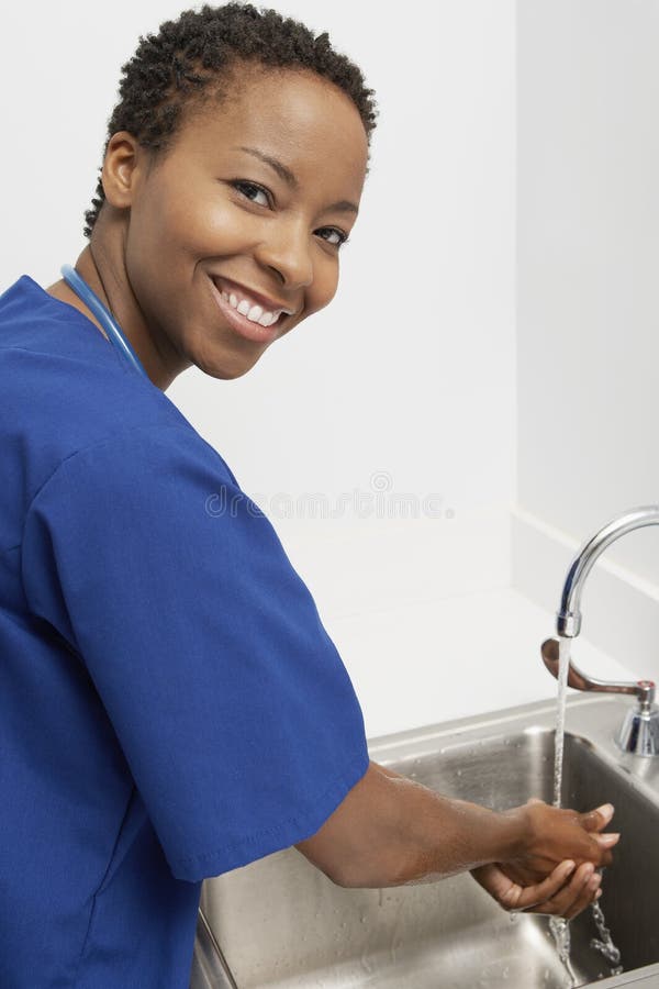Doctor Washing Hands in Basin Stock Photo - Image of hygienic, female ...