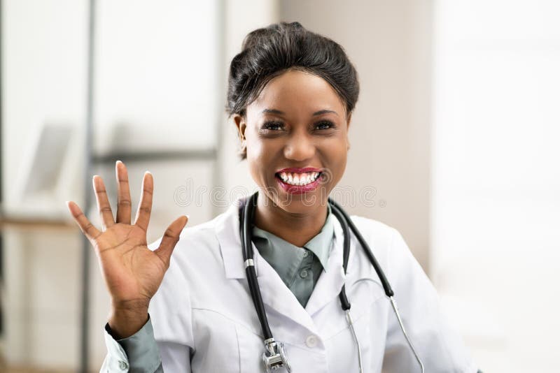 Doctor Waving in Online Video Call Stock Photo - Image of clinic ...