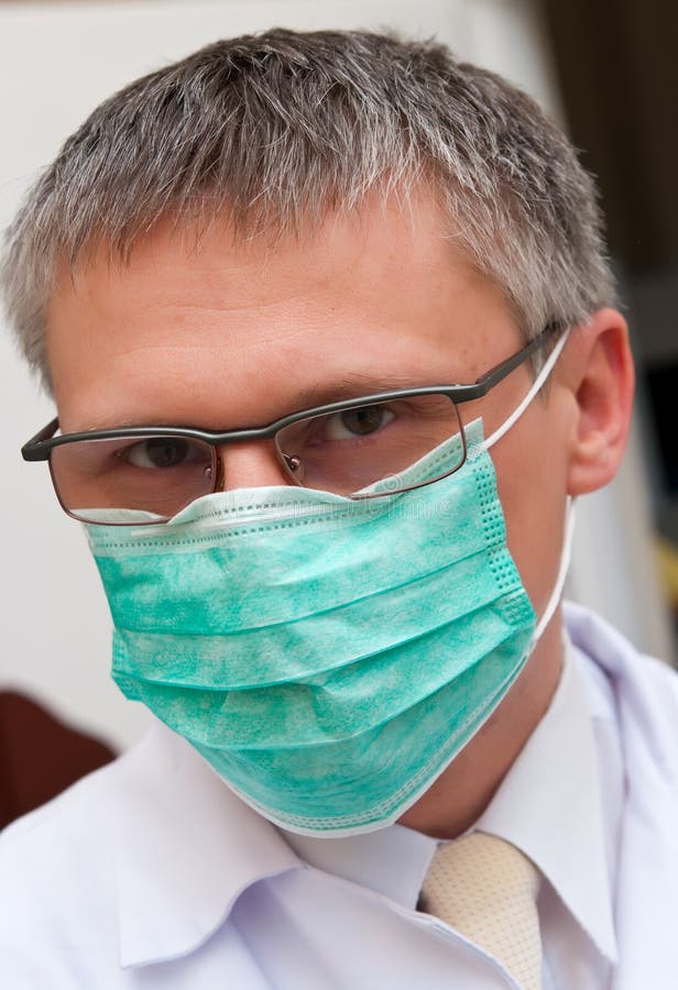 Doctor wearing mask stock image. Image of facial, grey - 14016233