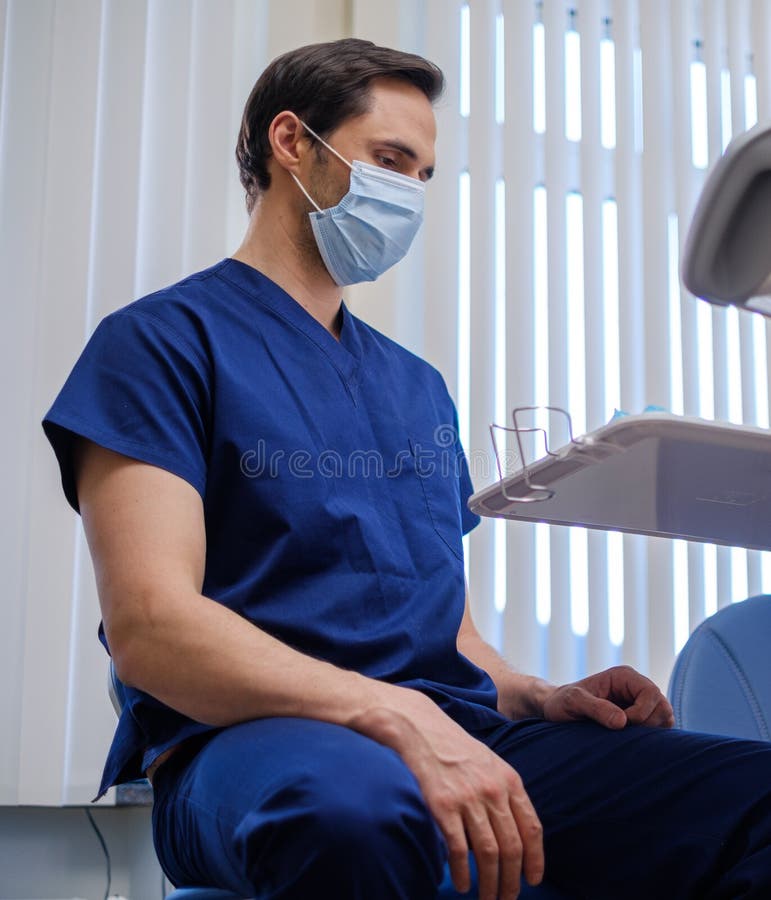 Doctor Wearing Protective Mask in a Hospital Stock Photo - Image of ...