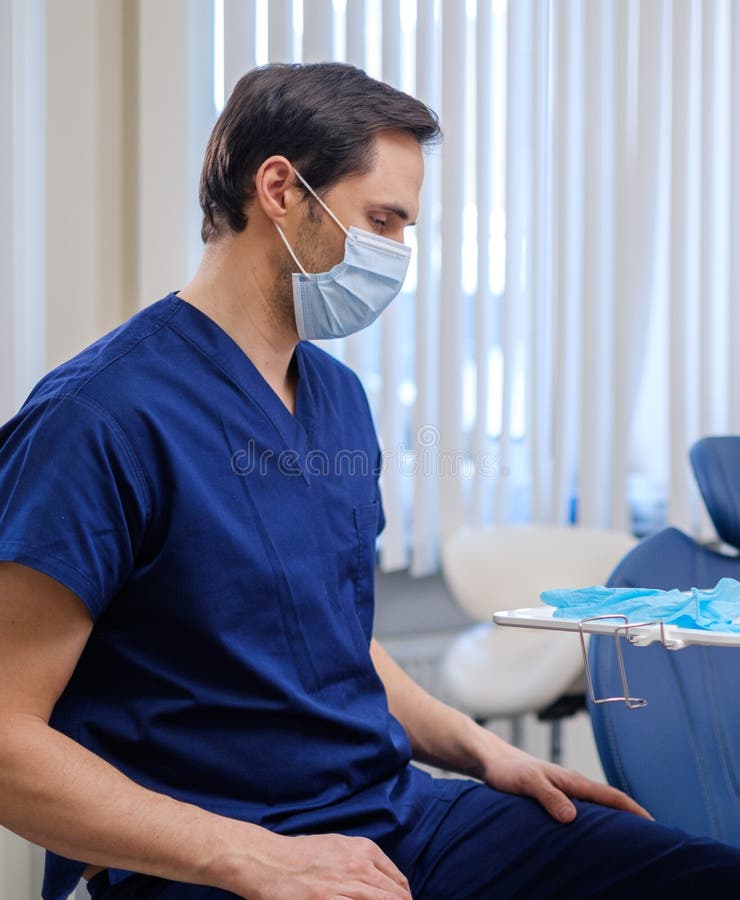 Doctor Wearing Protective Mask in a Hospital Stock Photo - Image of ...
