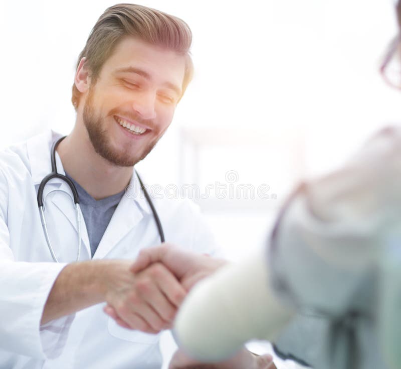 Doctor Welcoming a Patient in His Studio Stock Photo - Image of clinic ...