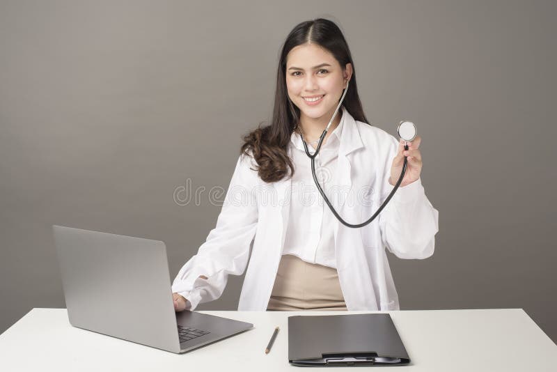 Doctor Woman is Analysis Data on Laptop Computer Stock Image - Image of ...