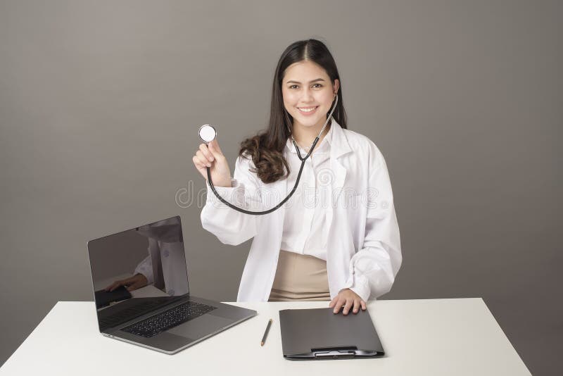 Doctor Woman is Analysis Data on Laptop Computer Stock Photo - Image of ...