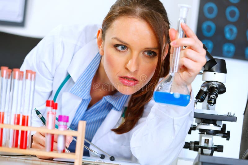 Doctor Woman Analyzing Results of Medical Test Stock Photo - Image of ...