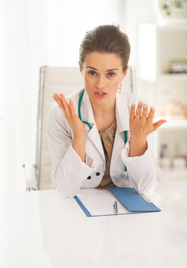 Doctor Woman Explaining Something Stock Image - Image of office, care ...