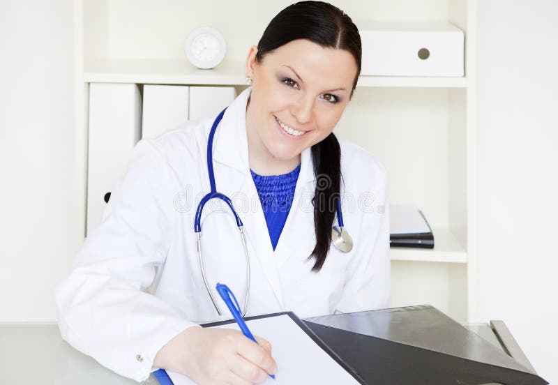 Doctor Woman Making Notes in Surgery Office Stock Image - Image of ...
