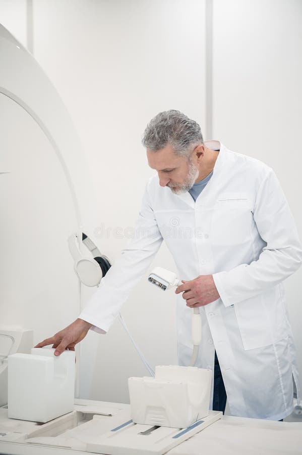 Doctor in a Lab Coat Standing Near MRI Scanner Stock Photo - Image of ...