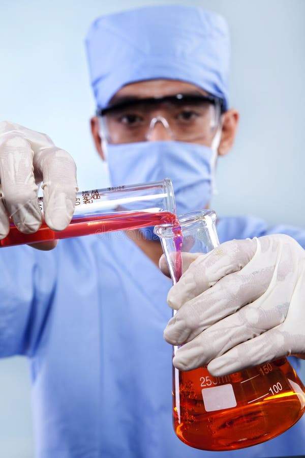 Scientist with chemicals stock photo. Image of concentration - 26450894