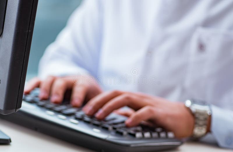 Doctor Working on the Computer Stock Photo - Image of office, physician ...