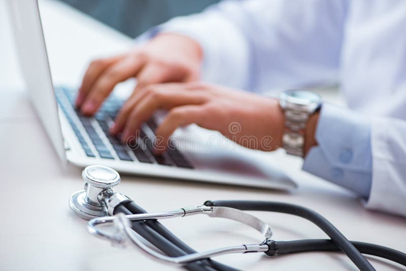 The Doctor Working on the Computer Stock Image - Image of business ...