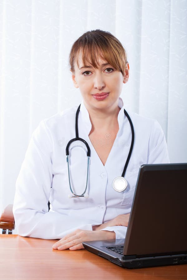 Doctor working in hospital stock photo. Image of confident - 29028204