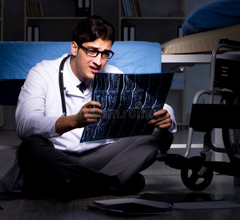 Doctor Working Night Shift in Hospital after Long Hours Stock Image ...